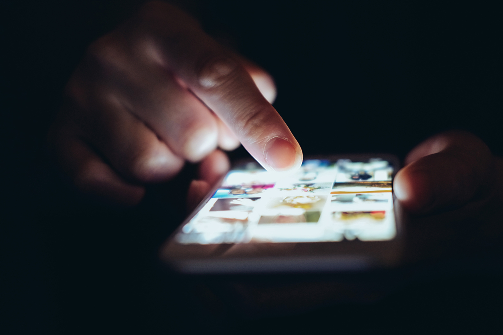 Is Zombie Scrolling Syndrome Zapping Your Child's Health? | McAfee Blog